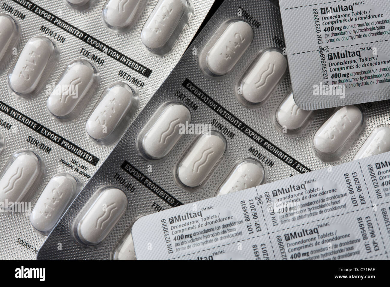 Blister packs of Multaq tablets. Four blister packs of Multaq tablets ...