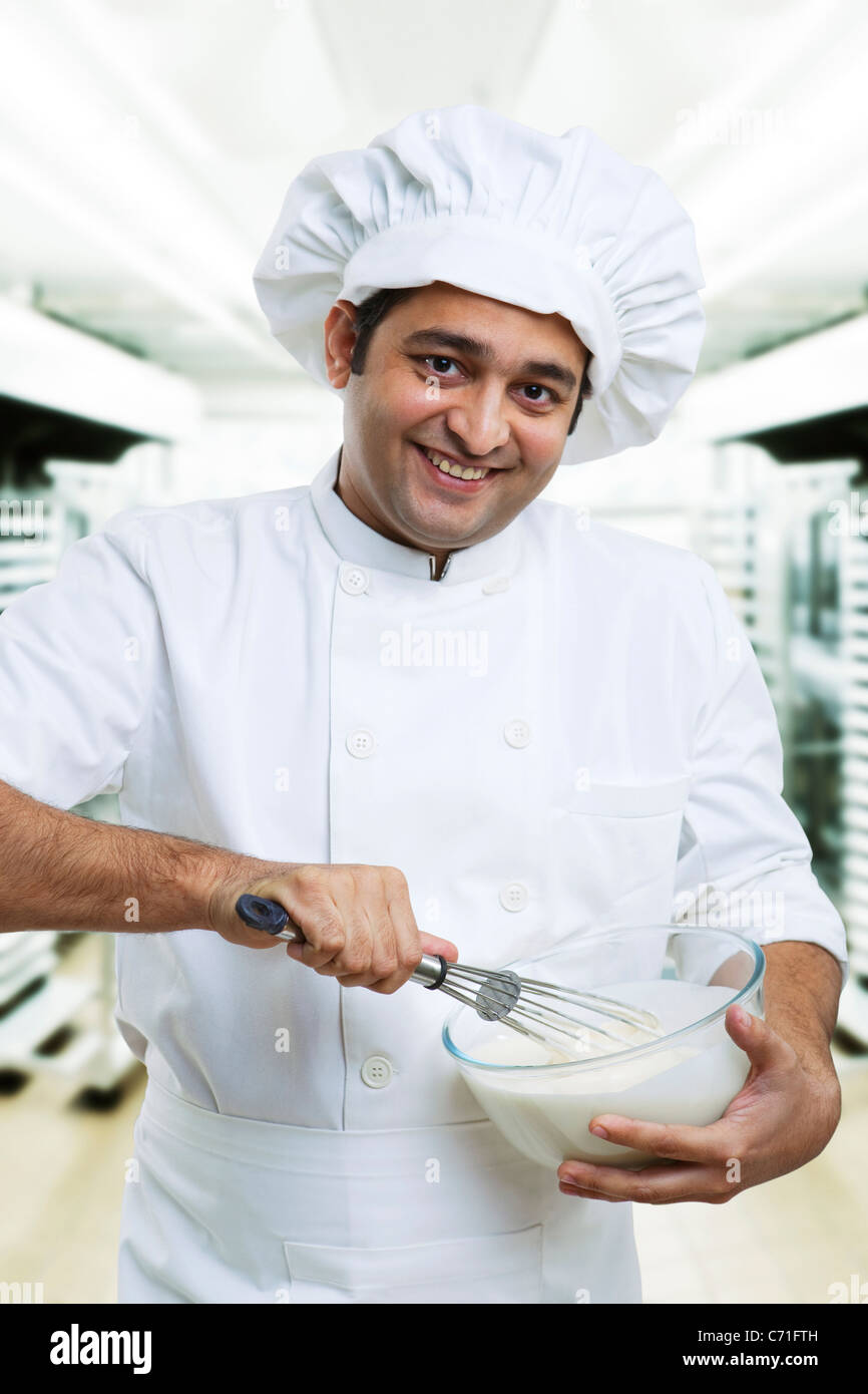 Men beating hi-res stock photography and images - Alamy