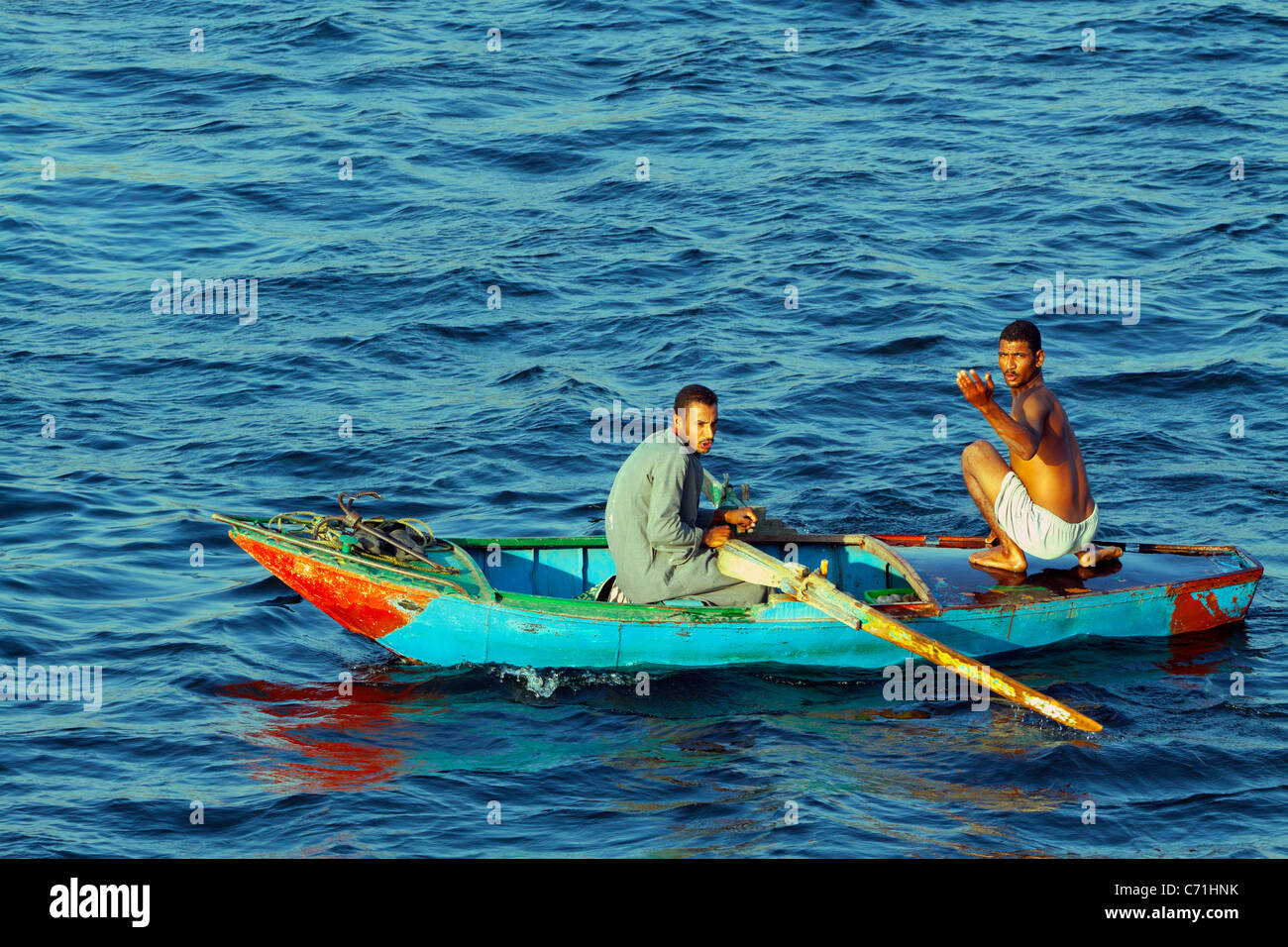 Two Egyptian males in a rowing boat Stock Photo - Alamy