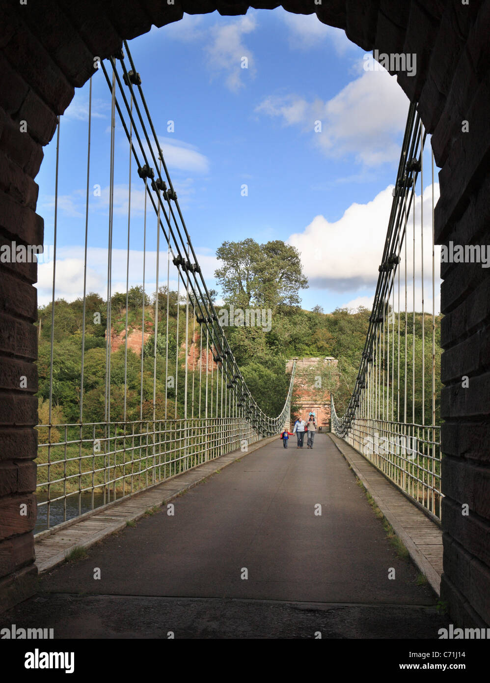 Family crossing the Chain Bridge or Union Bridge, between Horncliffe in ...