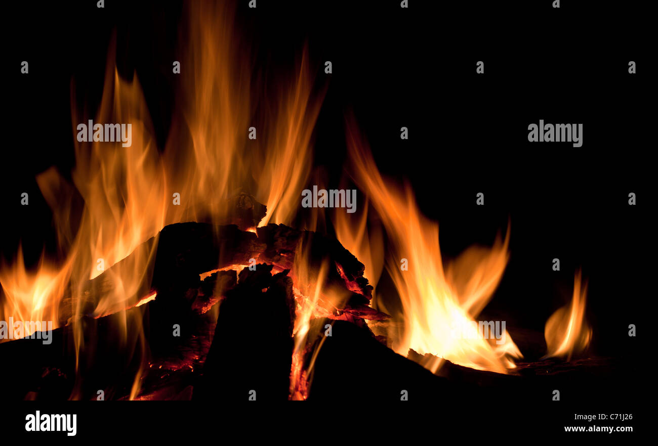 Burning log flames glowing hi-res stock photography and images - Alamy
