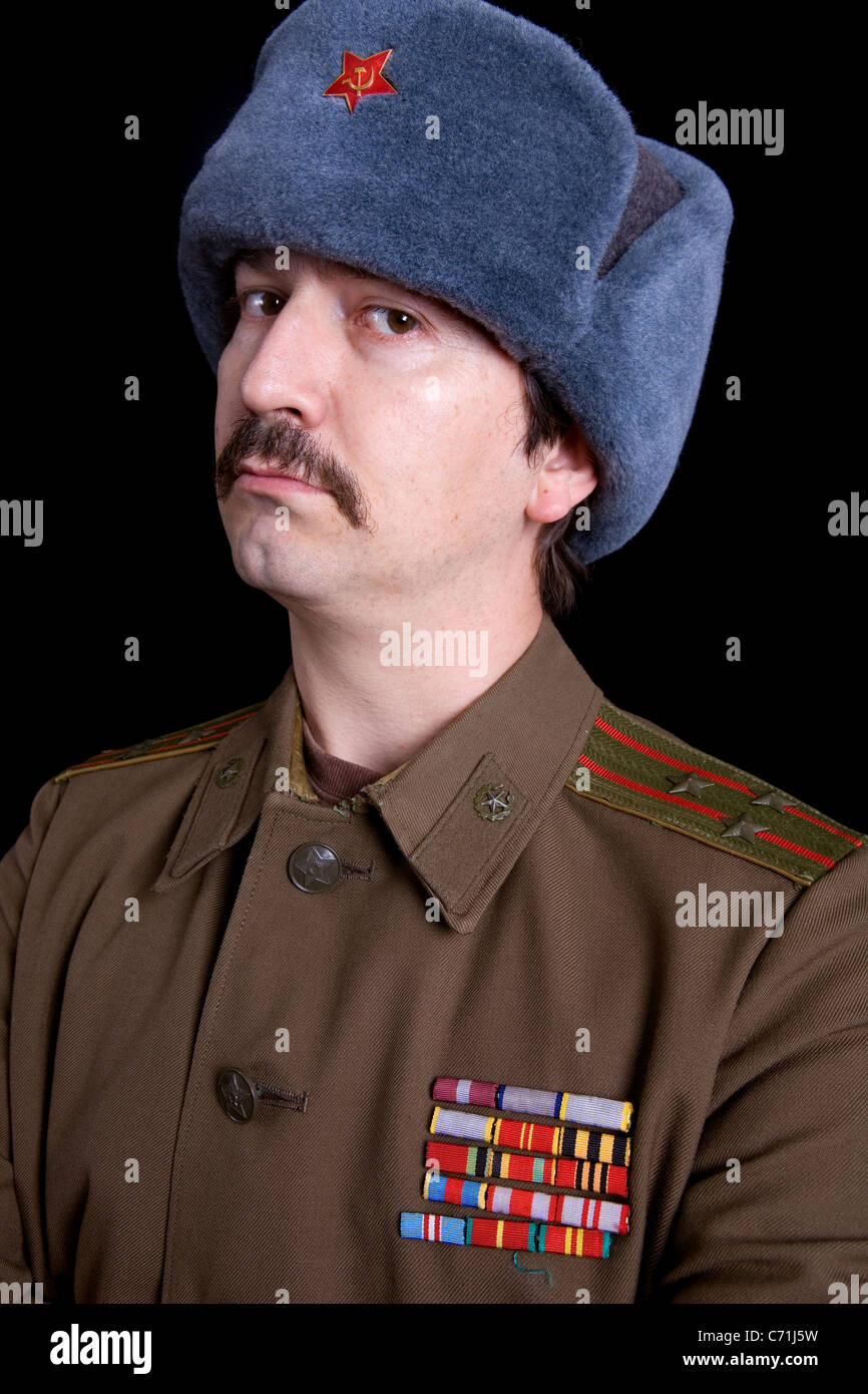 young man dressed as russian military, studio Stock Photo - Alamy