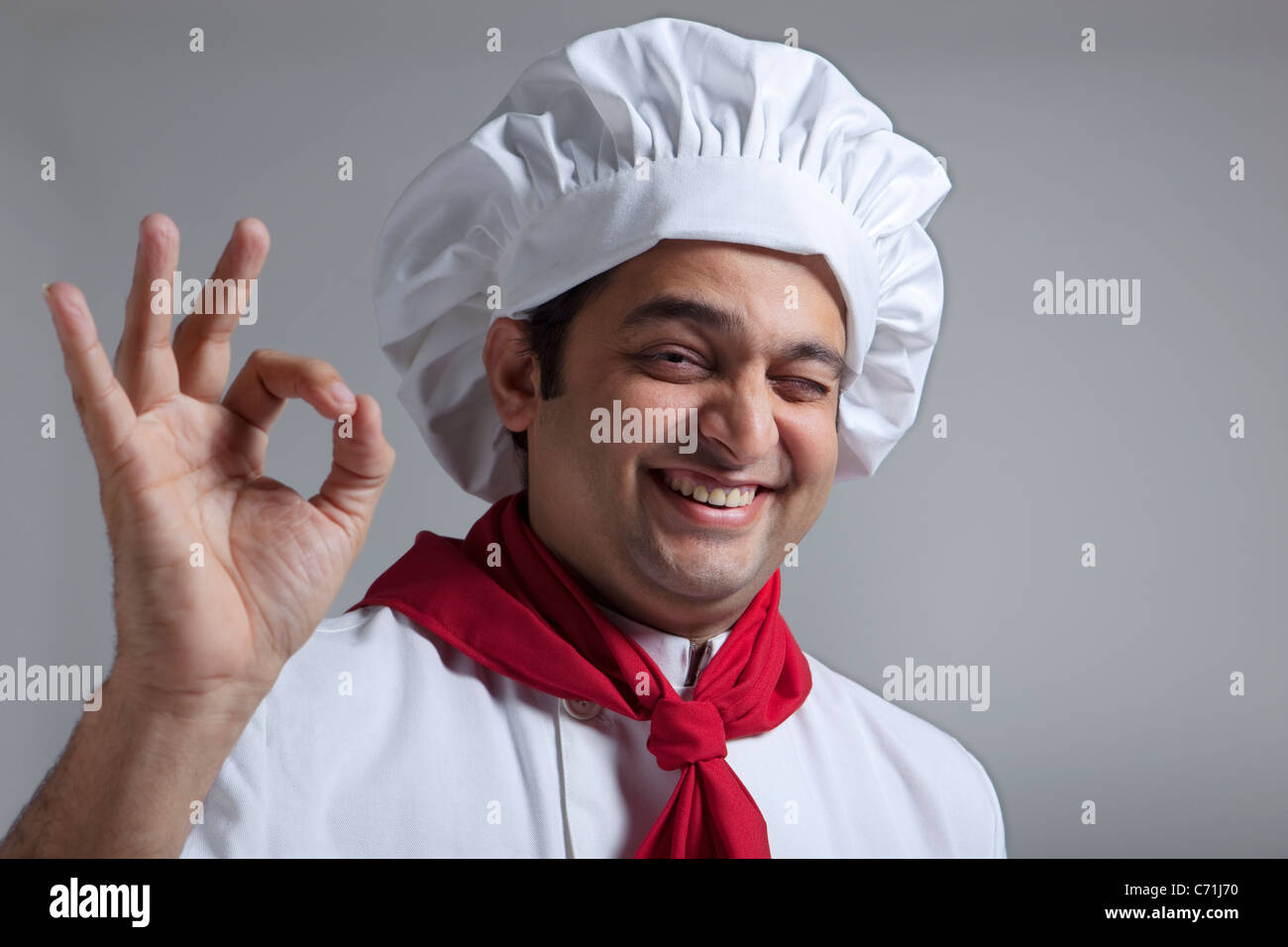 Chef giving the okay sign Stock Photo - Alamy