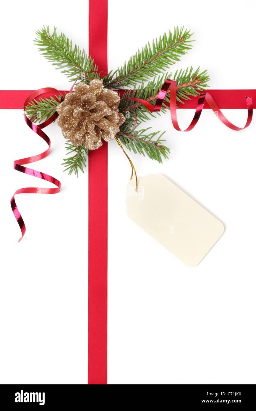 Pine branches red bow Cut Out Stock Images & Pictures - Alamy