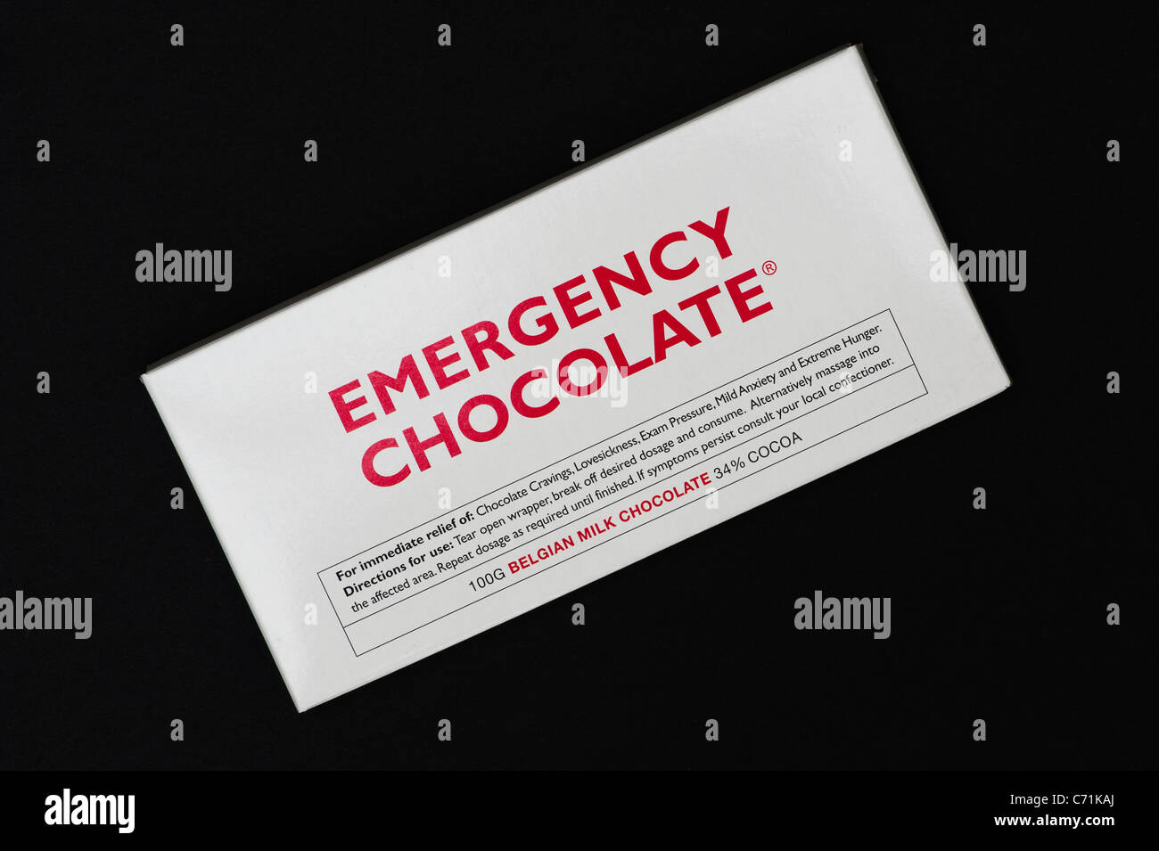 Emergency Chocolate packet on black background. Belgian milk chocolate ...