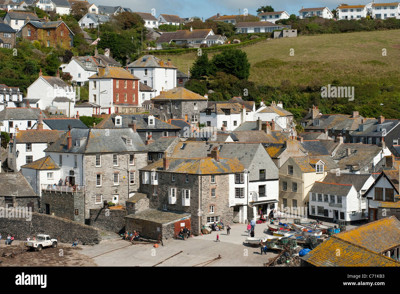 Tourists visiting the pretty seaside fishing village of Port Isaac in ...