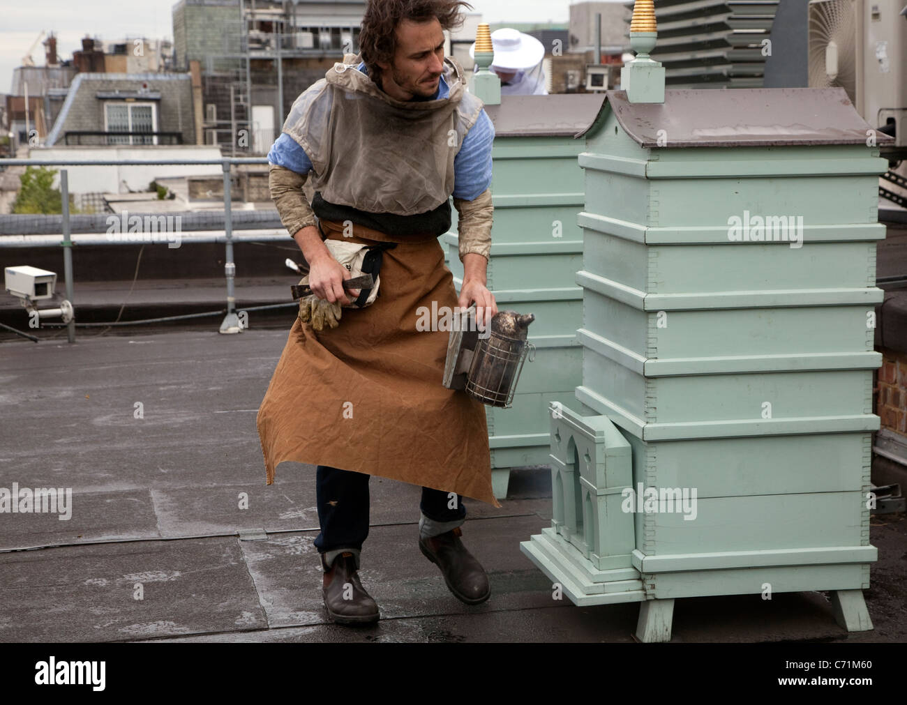 Beehives on roof of Fortnum & Mason, London - beekeeper Steve Benbow ...