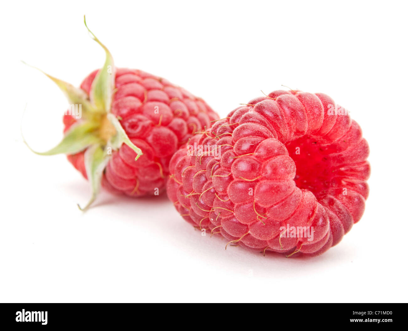 Sweet raspberry fruit closeup isolated on white background Stock Photo ...