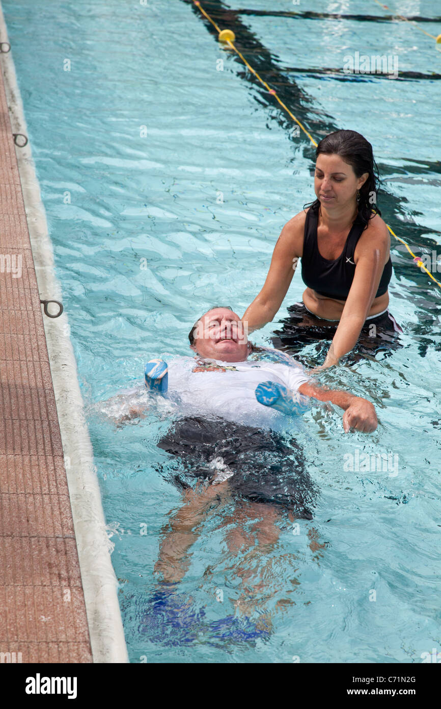 Acquired brain injury patients with disabilities participate in an ...