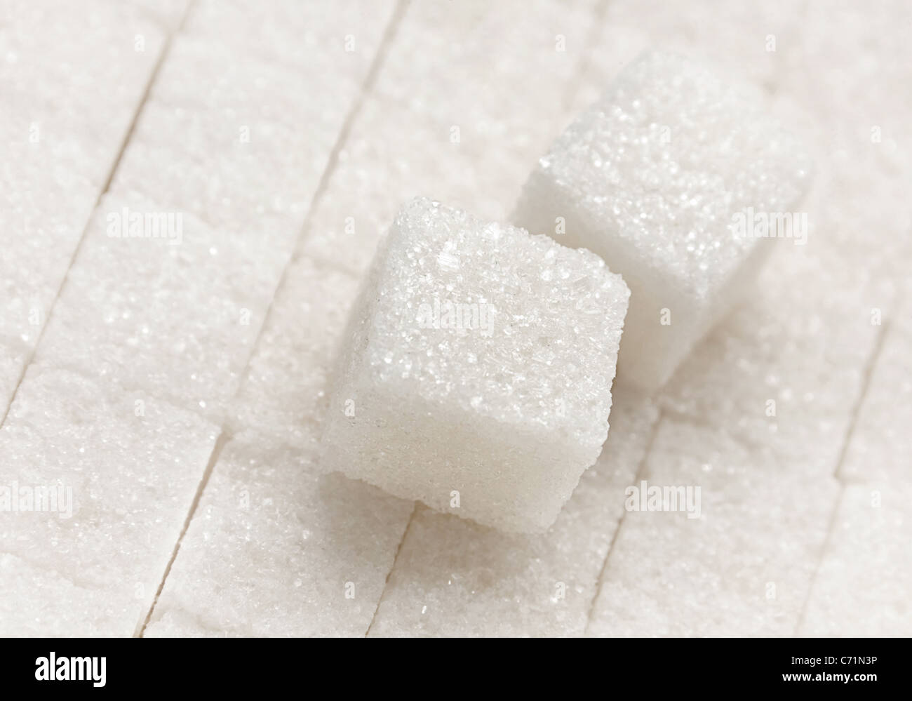 Sweet food refined white sugar cube closeup Stock Photo - Alamy