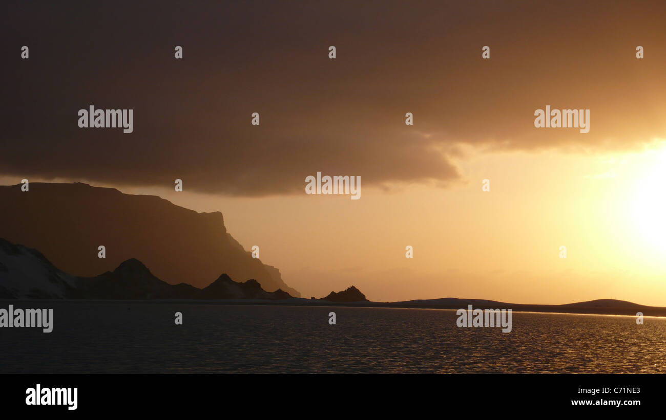 A spectacular sunset at Qalansiyah beach, Socotra, Yemen Stock Photo ...
