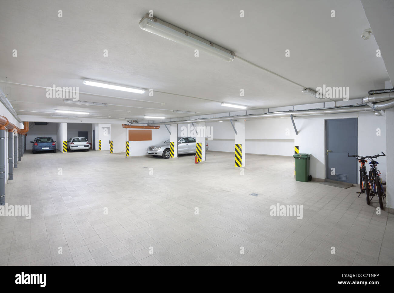 Interior of a hotel garage, simple, empty and white Stock Photo - Alamy