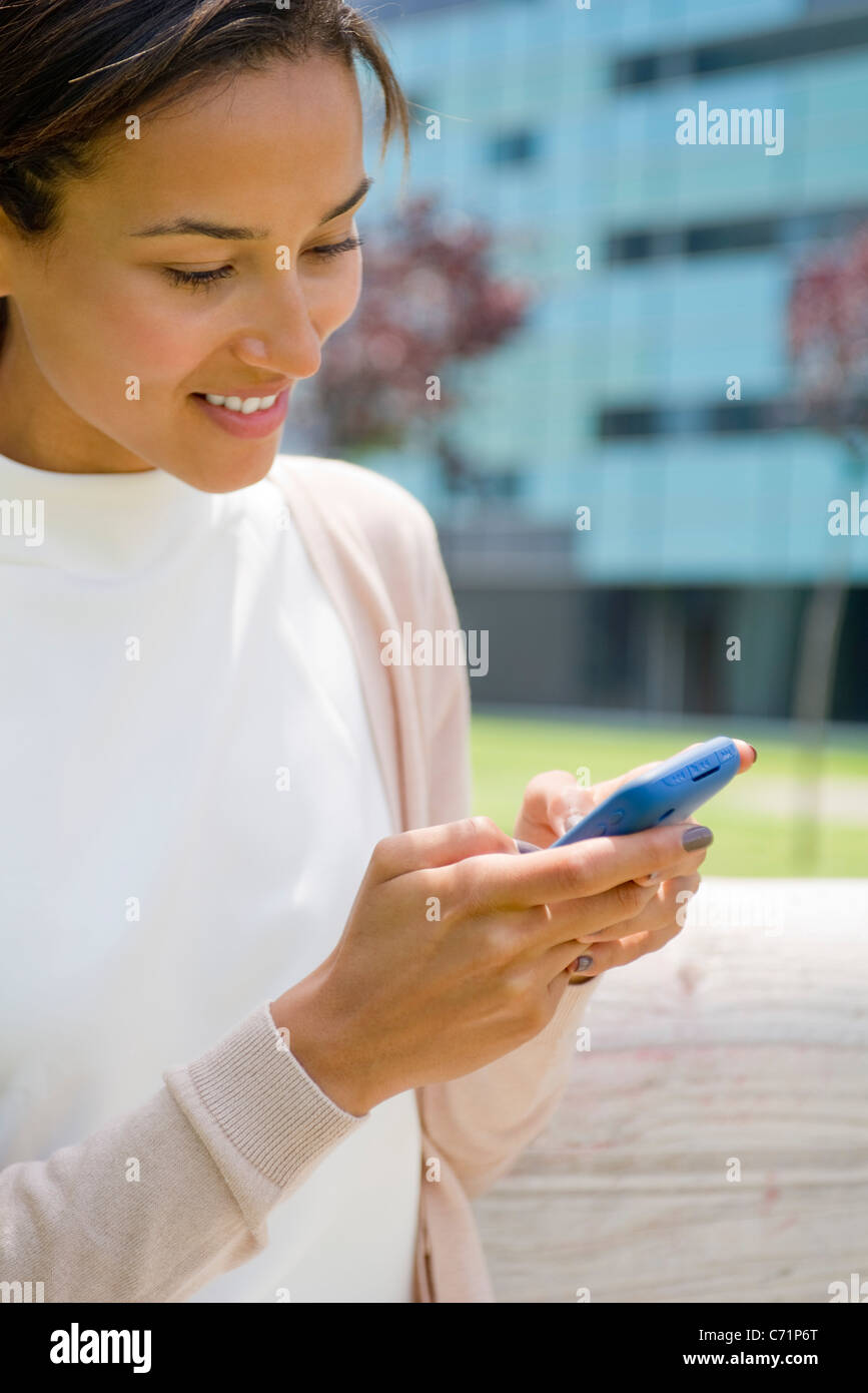 Woman text messaging Stock Photo - Alamy