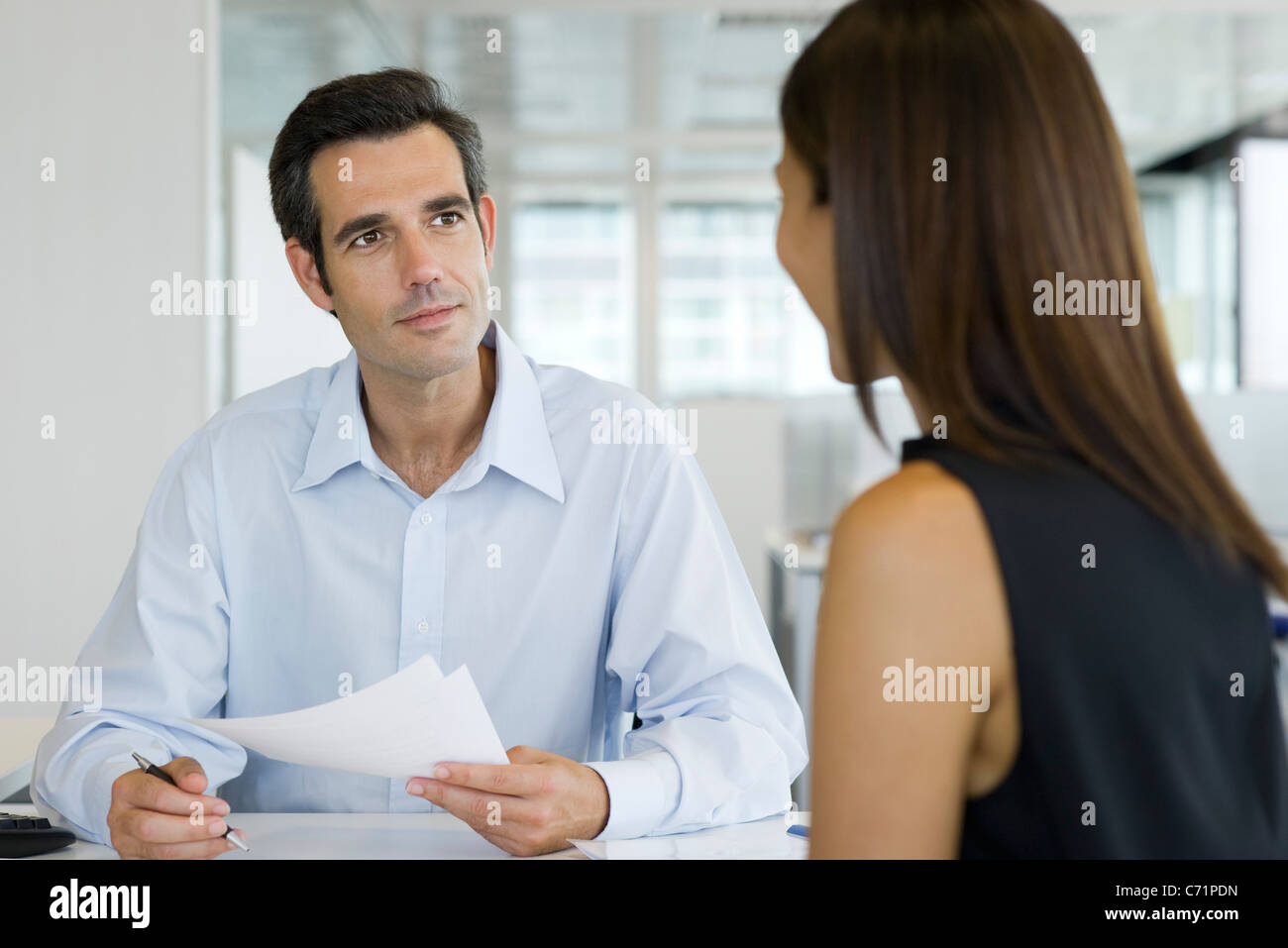 Businessman conducting job interview Stock Photo - Alamy