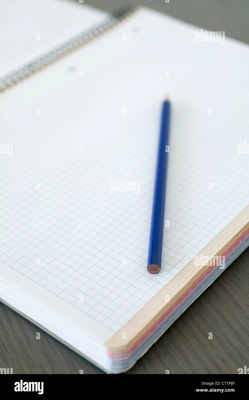 Notebook and pencil Stock Photo - Alamy