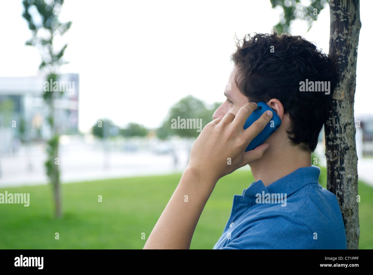 Side view young man talking hi-res stock photography and images - Alamy