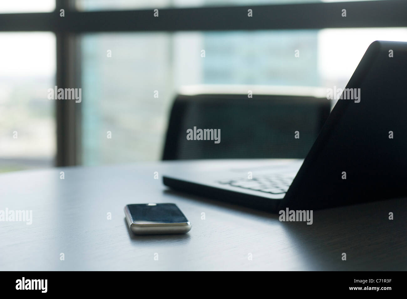 Cell phone and laptop computer Stock Photo - Alamy