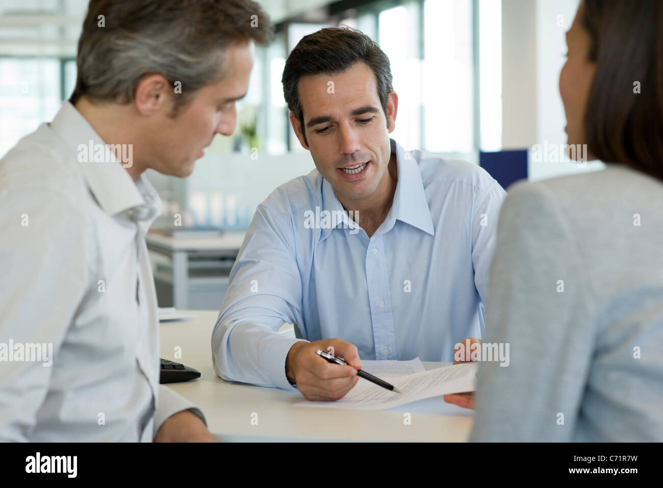 Businessman meeting with clients Stock Photo - Alamy