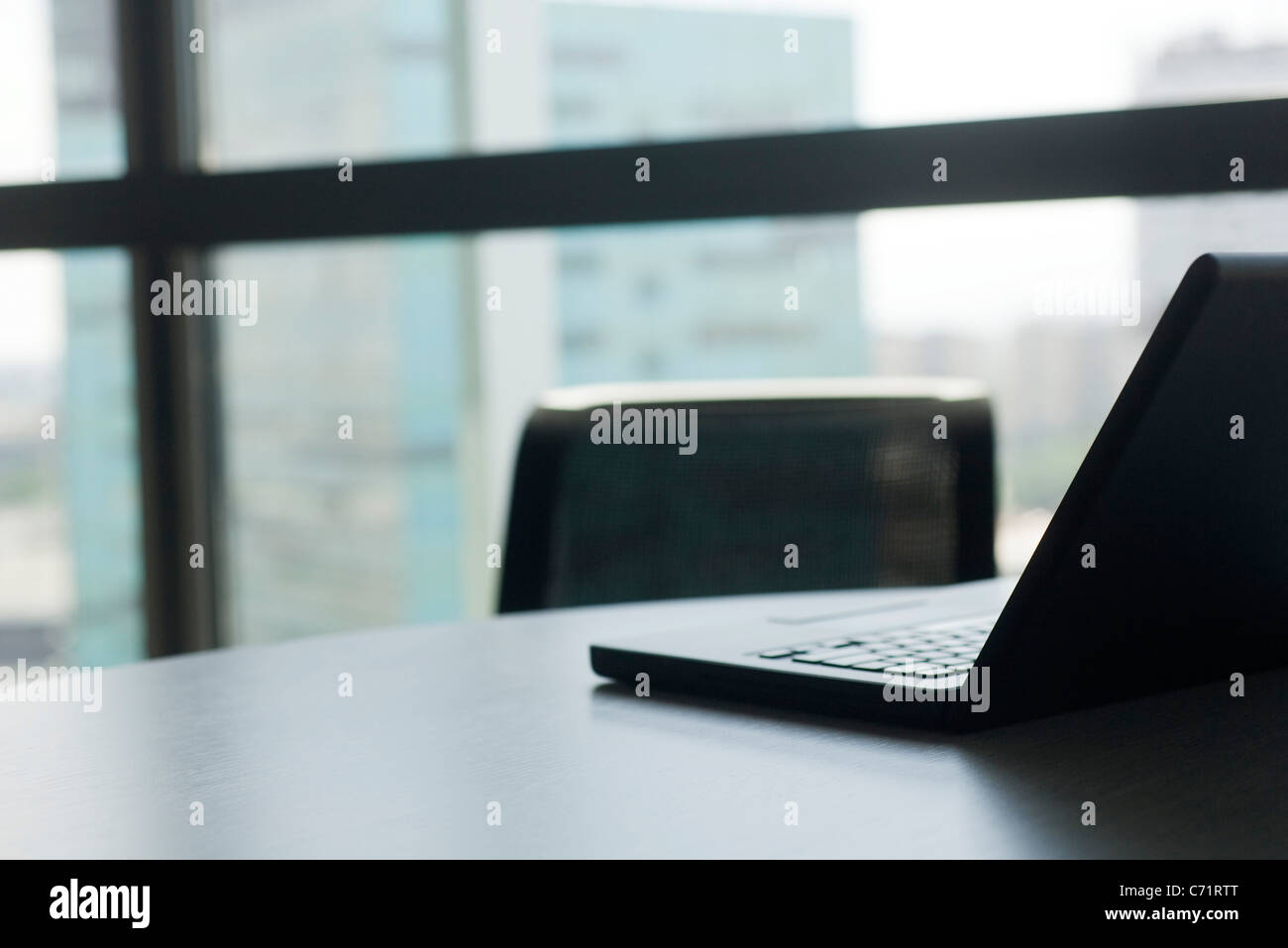 Laptop computer on desk Stock Photo - Alamy