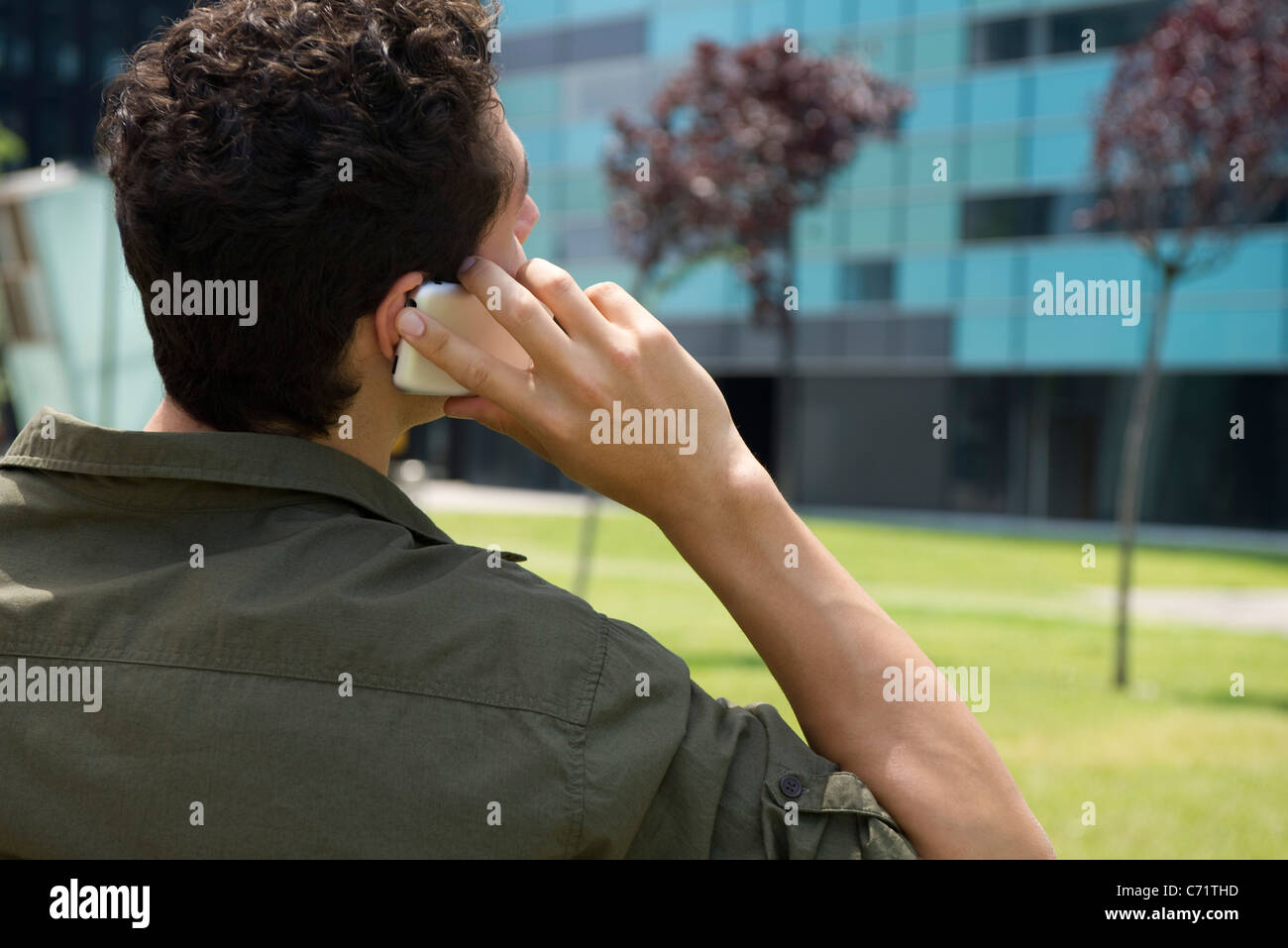 Talking on the phone rear view hi-res stock photography and images - Alamy
