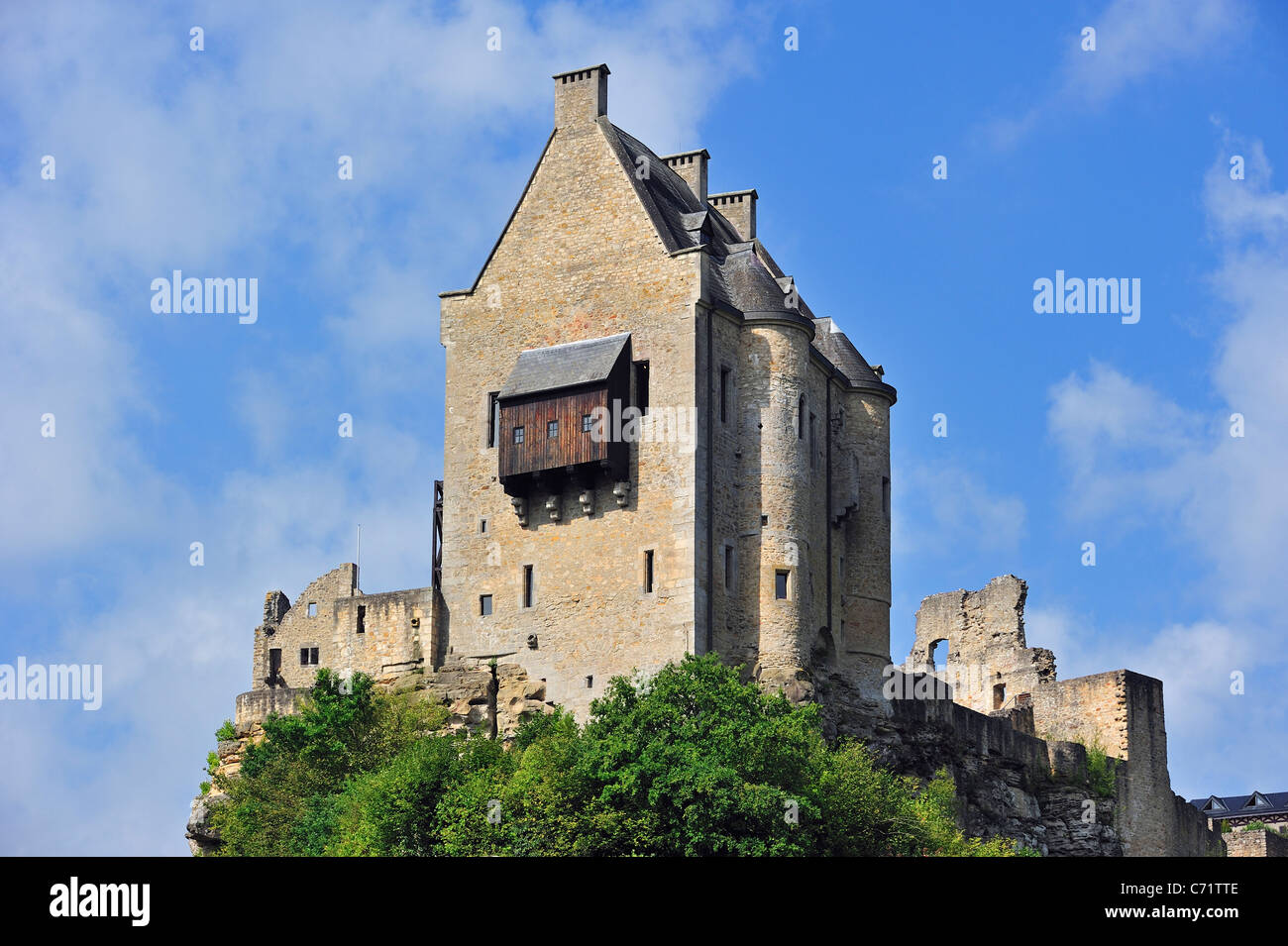Ruins of the medieval Larochette Castle towering above the town ...