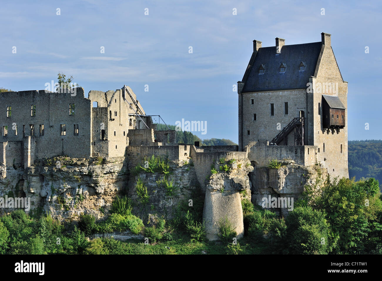 Ruins of the medieval Larochette Castle towering above the town ...