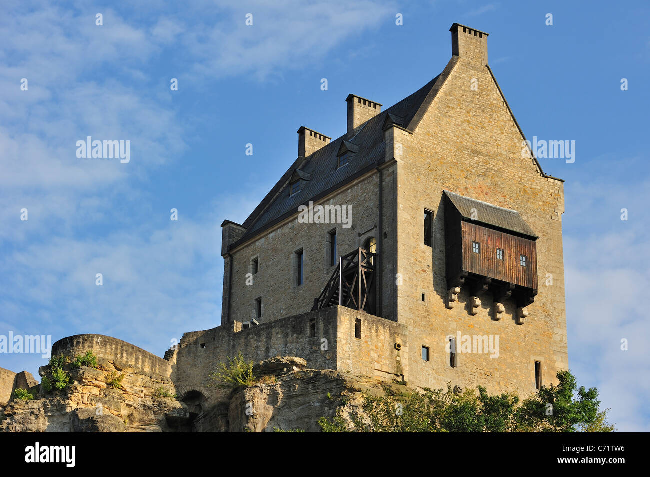 Ruins of the medieval Larochette Castle towering above the town ...