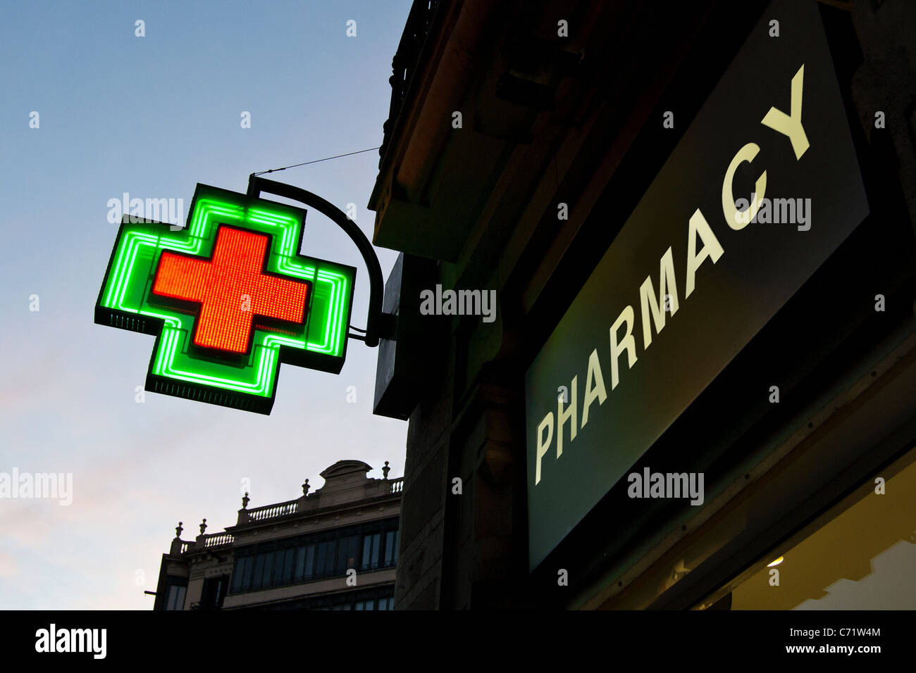 Pharmacy red cross sign with LED's Stock Photo - Alamy