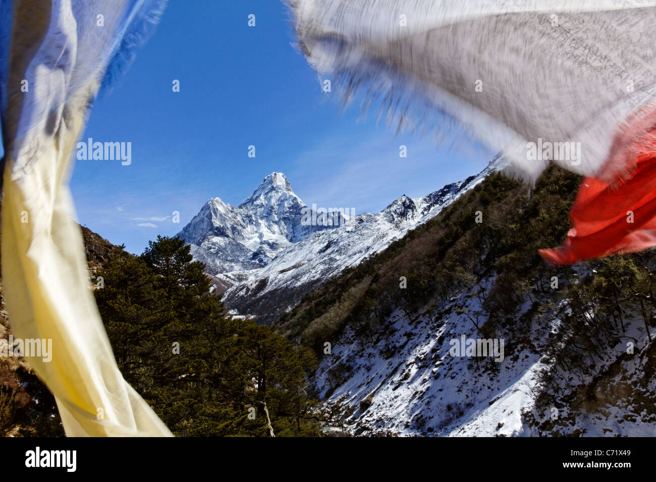 Ama Dadlam mountain and prayer flags, Everest Region, Nepal Stock Photo ...