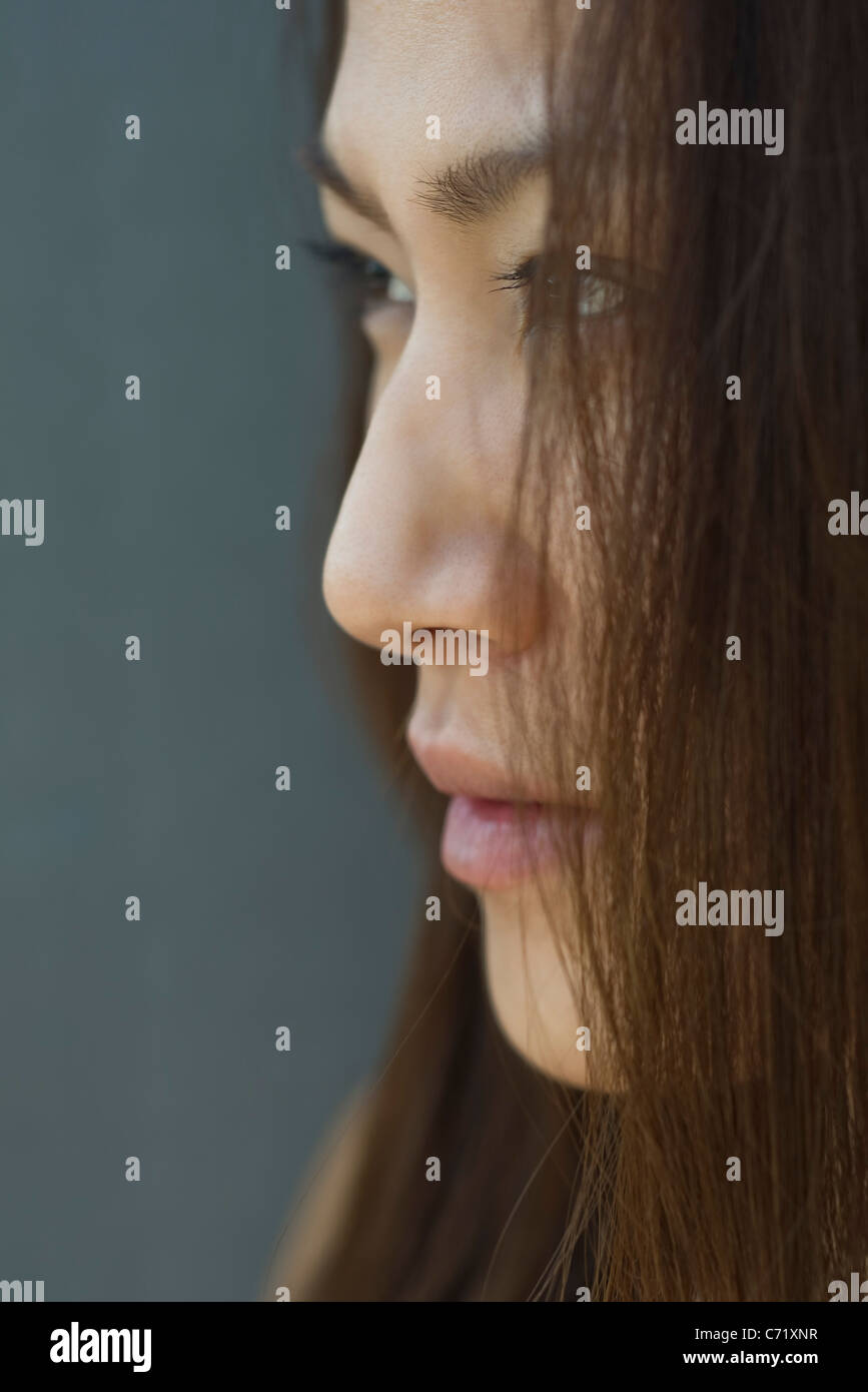 Young woman, side view Stock Photo - Alamy