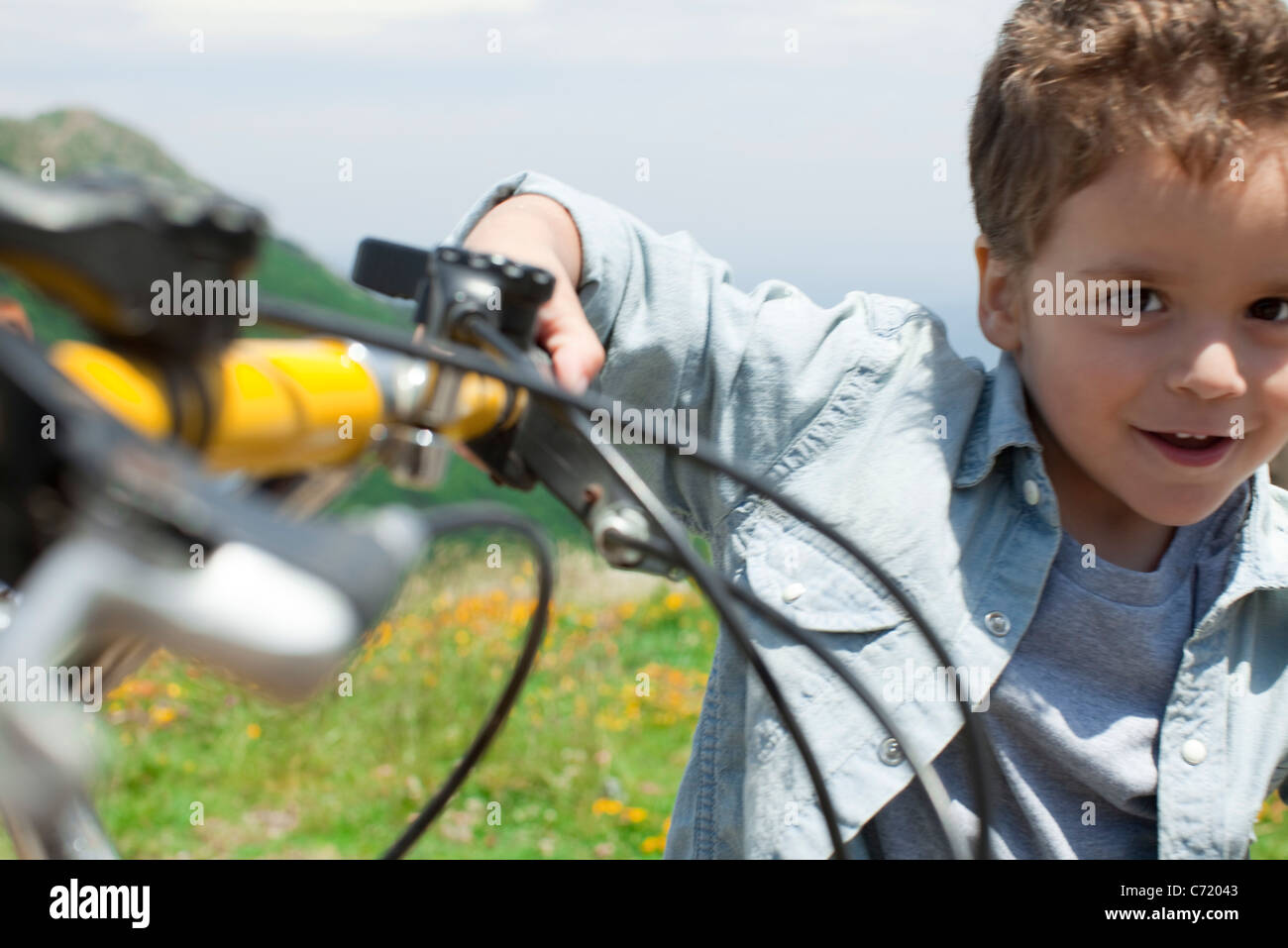 2 boys riding bikes hi-res stock photography and images - Alamy