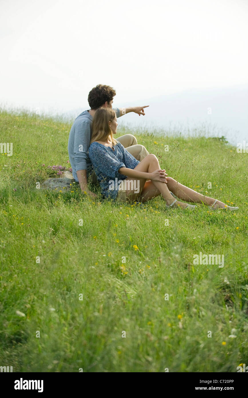 Couple couples distance grass hi-res stock photography and images - Alamy