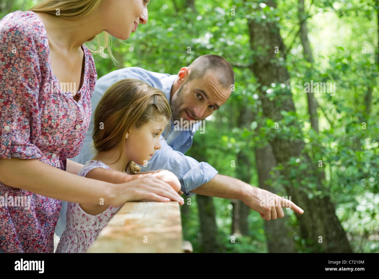 Child leaning over railing hi-res stock photography and images - Alamy
