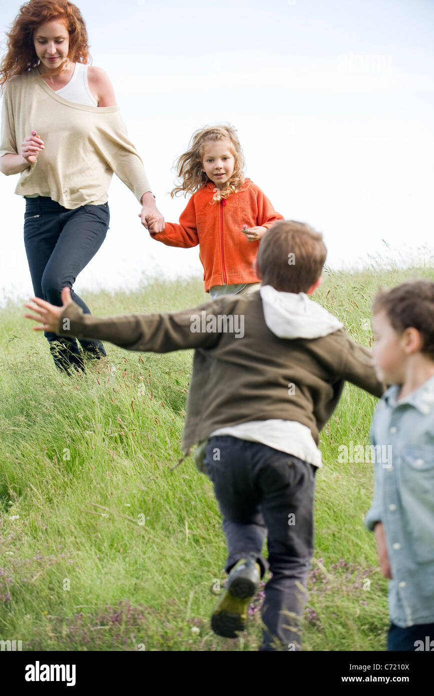Family having fun outdoors Stock Photo - Alamy