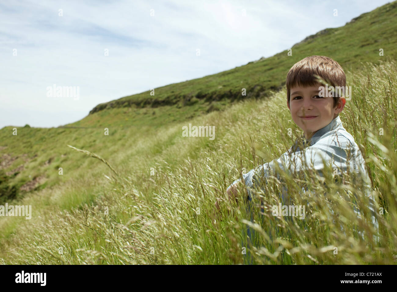 Boy in meadow, portrait Stock Photo - Alamy