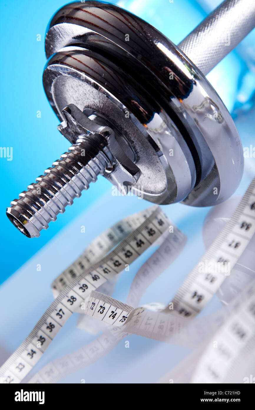 Measuring of dumbbell Stock Photo - Alamy