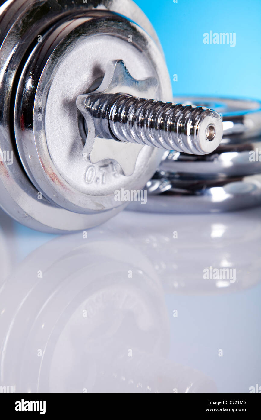 Measuring of dumbbell Stock Photo - Alamy