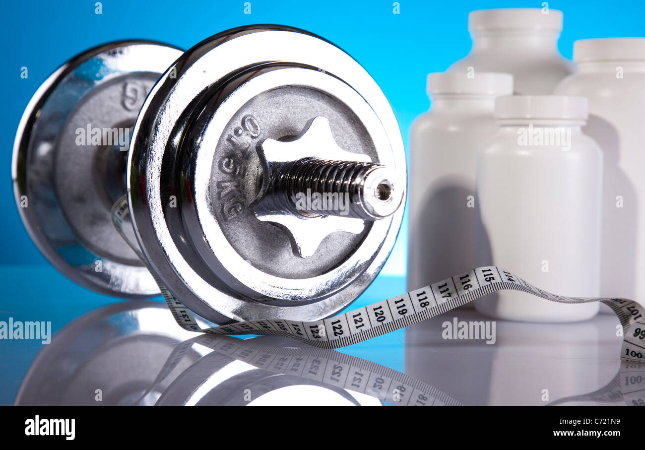 Measuring of dumbbell Stock Photo - Alamy