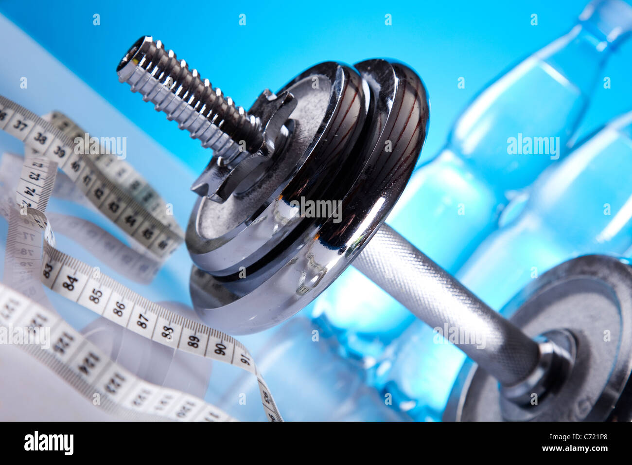 Measuring of dumbbell Stock Photo - Alamy
