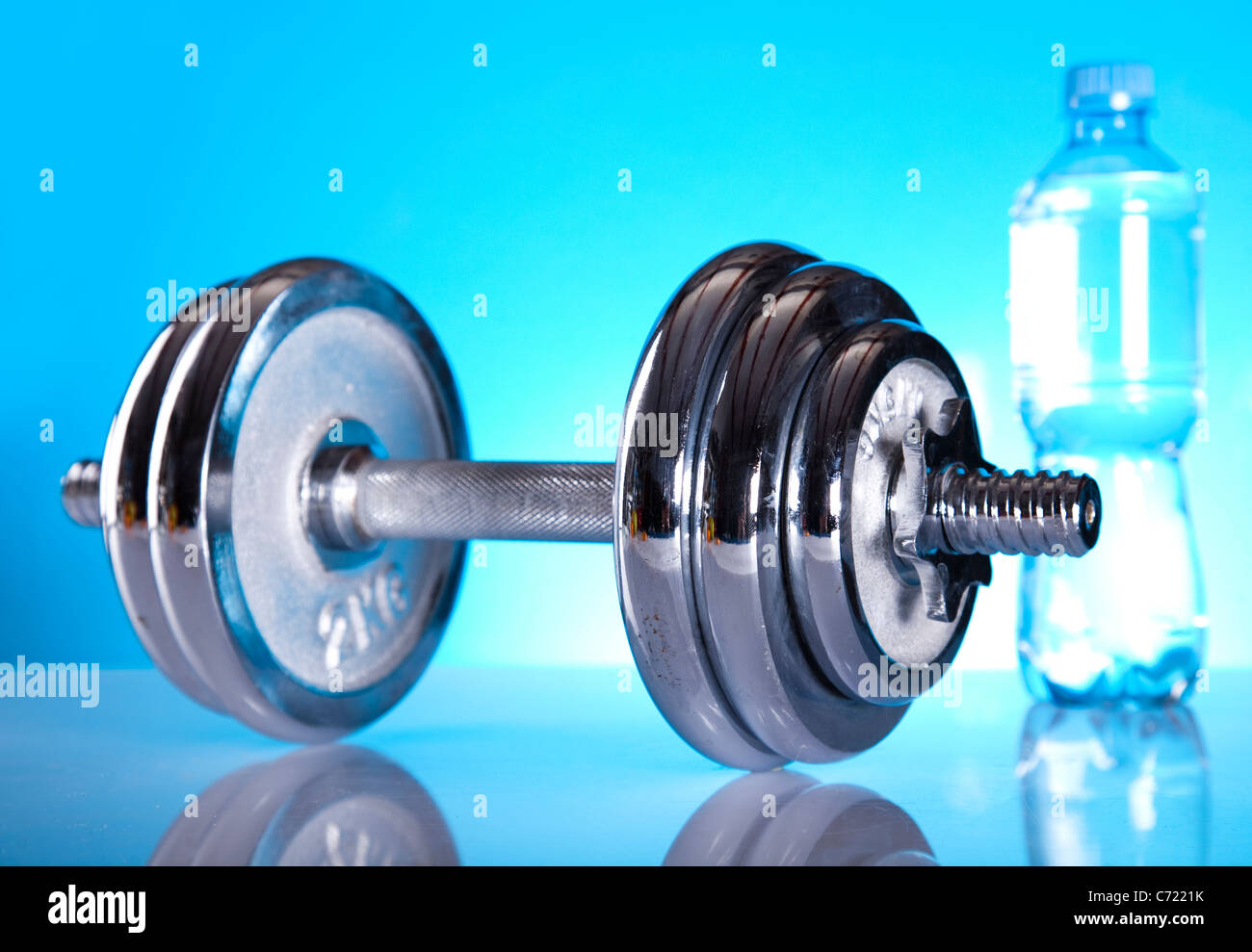 Measuring of dumbbell Stock Photo - Alamy