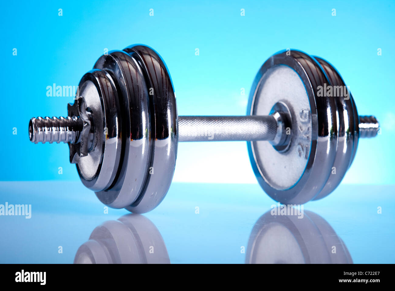 Measuring of dumbbell Stock Photo - Alamy