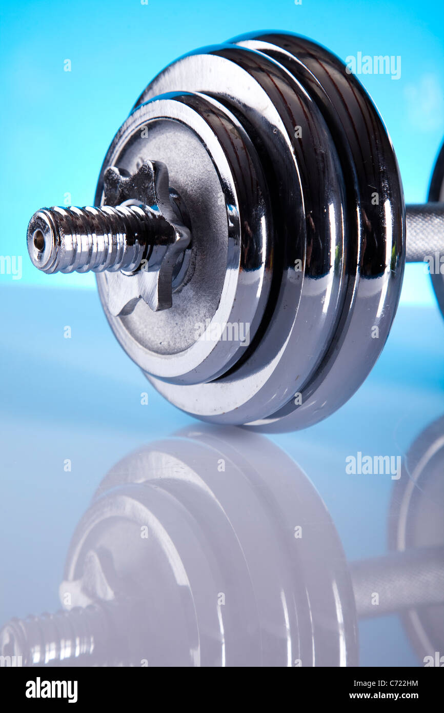 Measuring of dumbbell Stock Photo - Alamy