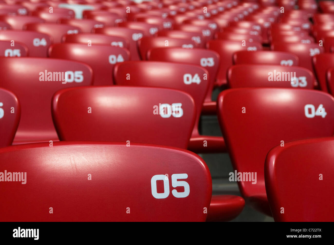 'Red chairs at a stadium' Stock Photo - Alamy