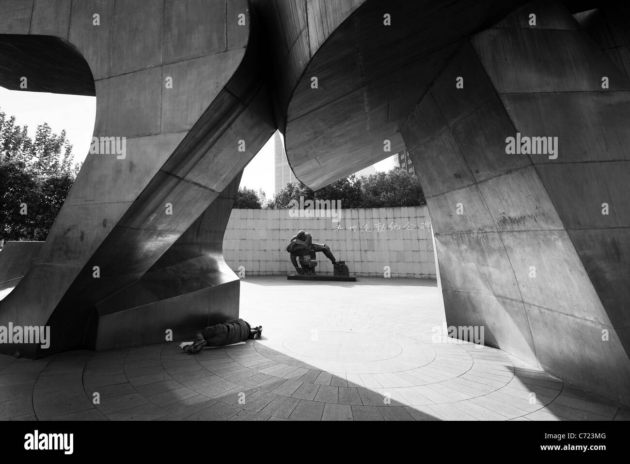 Homeless man and Communist monument, Peoples' Park, Shanghai Stock ...