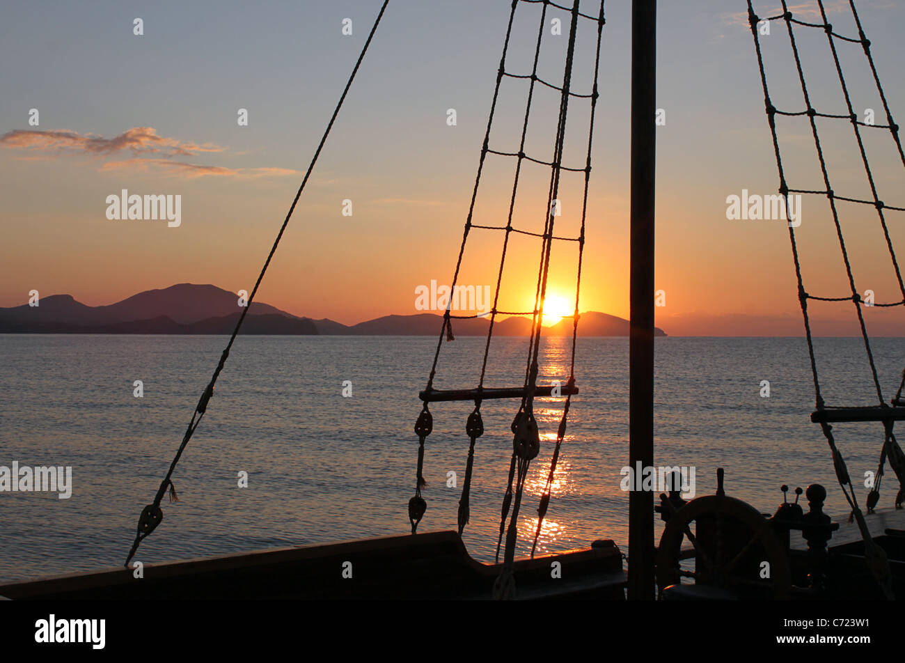view on sunrise through rigging of sail boat Stock Photo - Alamy