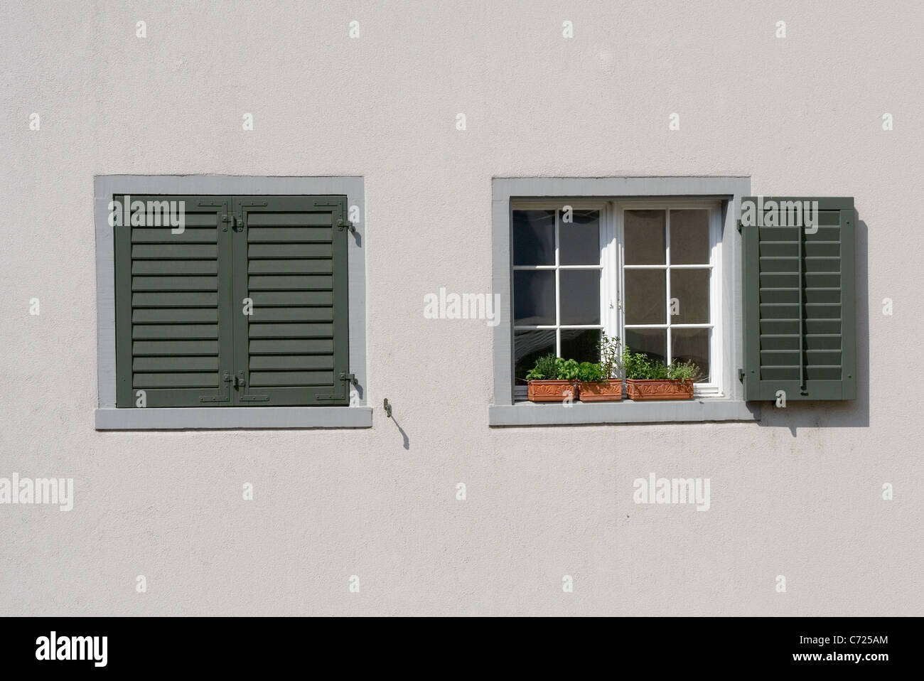 2 windows - open and shut Stock Photo - Alamy