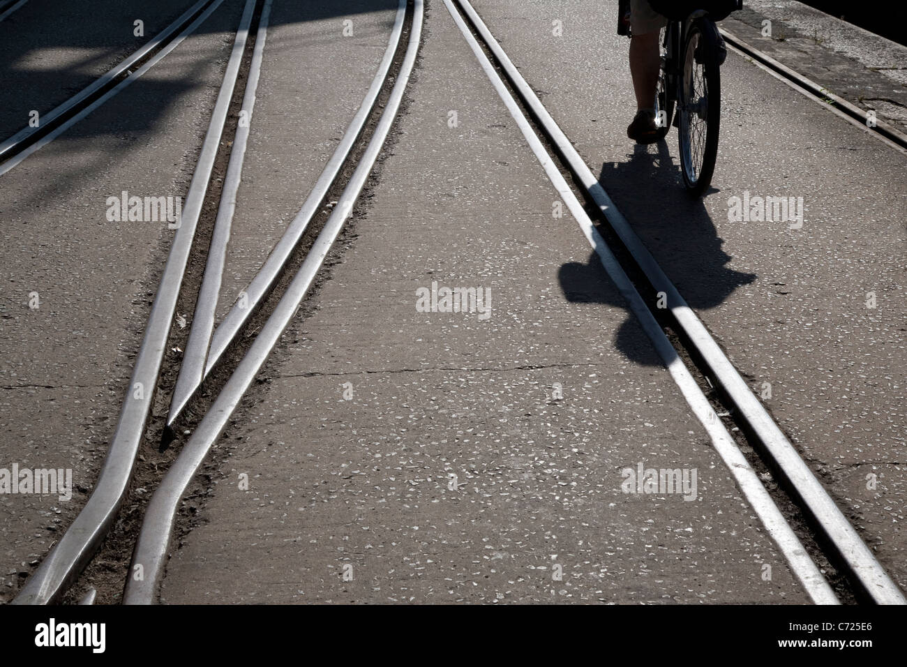Railroad Junction Track with Cyclist Stock Photo - Alamy
