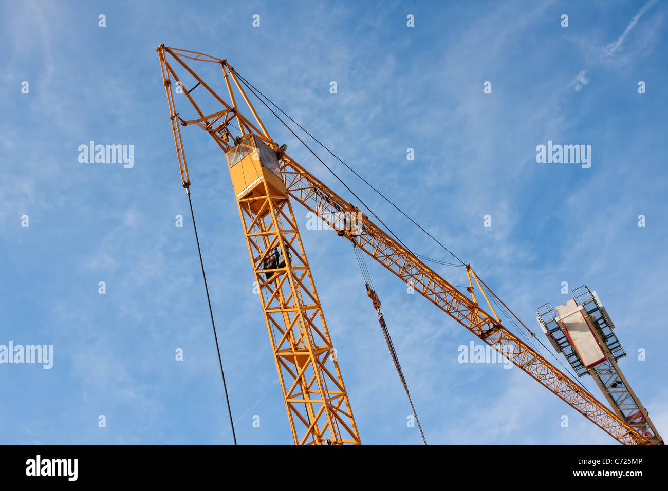 Crane on construction site Stock Photo - Alamy