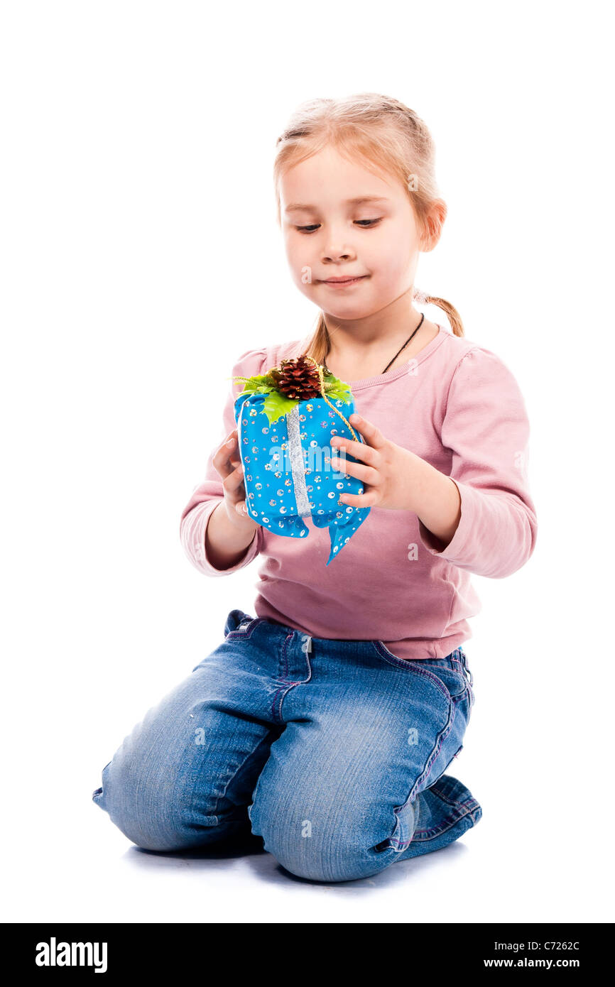 Beautiful girl with a present box isolated on white Stock Photo - Alamy
