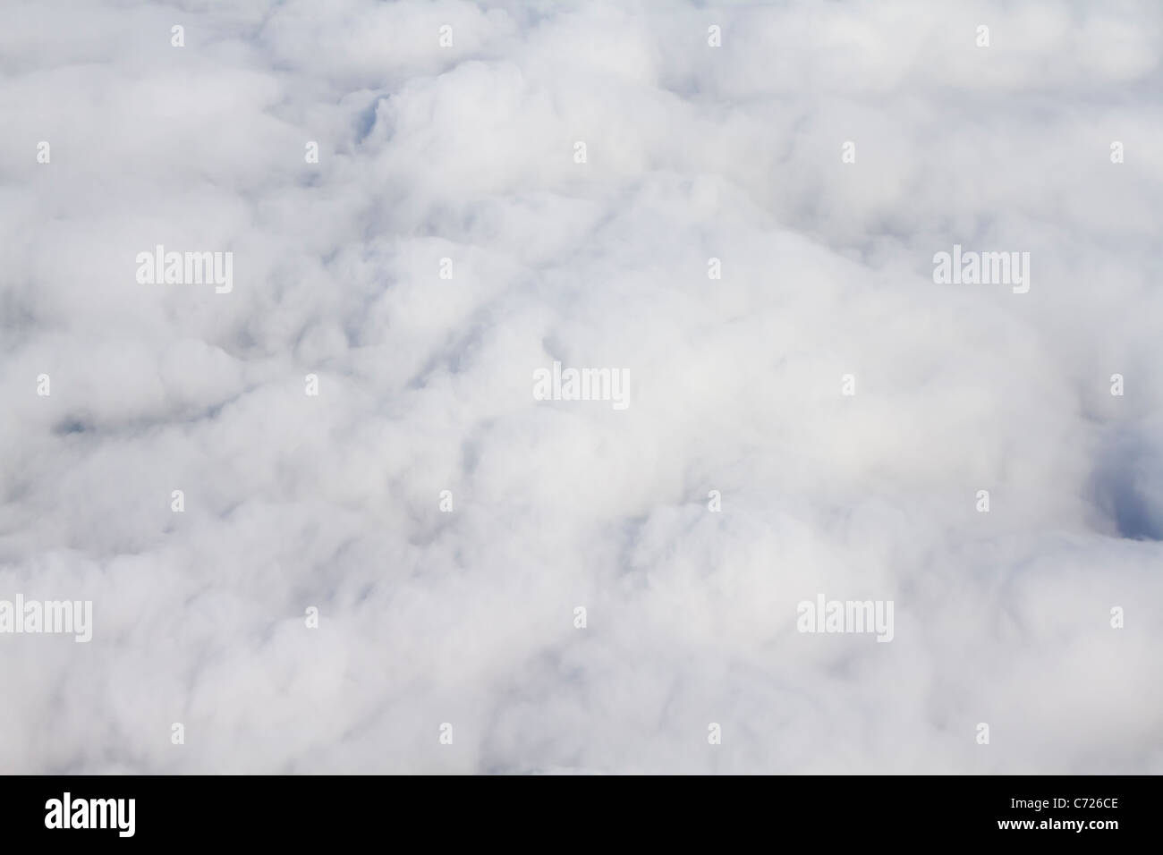 cloudscape looking down from above the clouds Stock Photo - Alamy